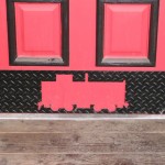 water-jet-cut-caboose-outline-kickplate - Acutech Fabrication